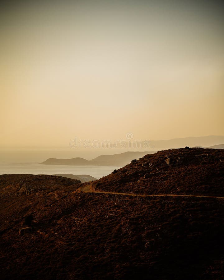 Vertical Shot of a Road on the Hillside at Sunset. Stock Image - Image ...