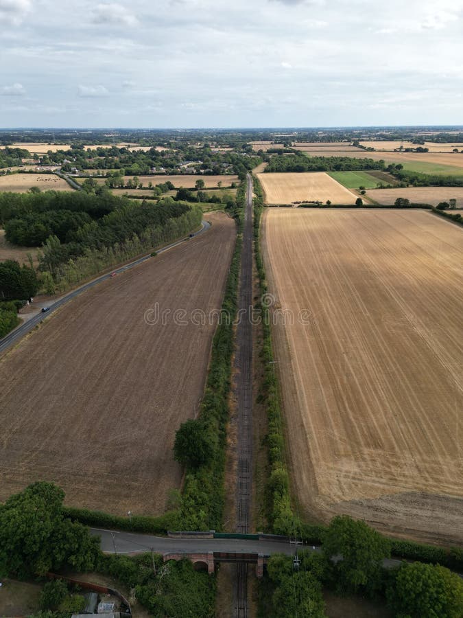 Vertical Shot of a Road Separating Cultivated Fields from an Aerial ...