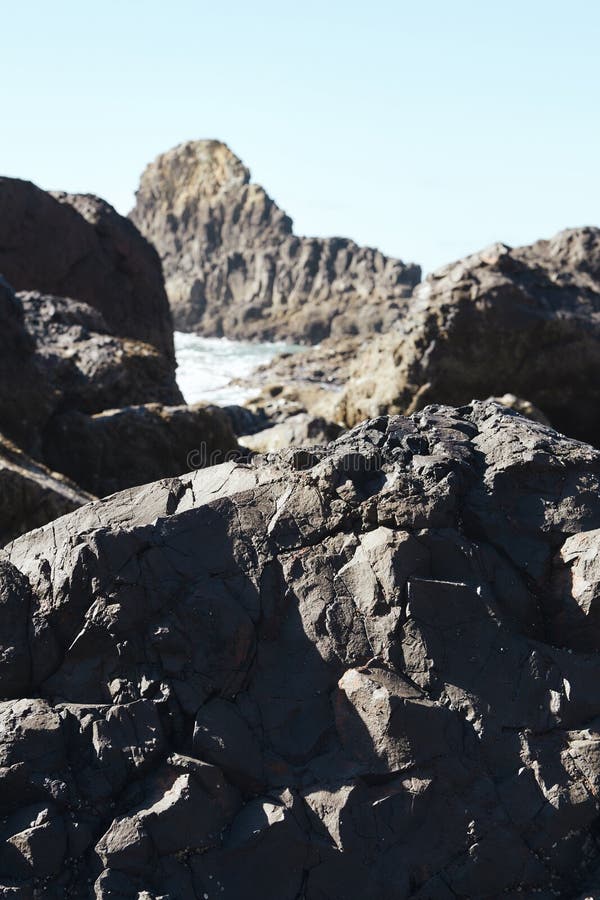 Vertical Shot of Rocks at the Coastline of the Pacific Northwest in ...