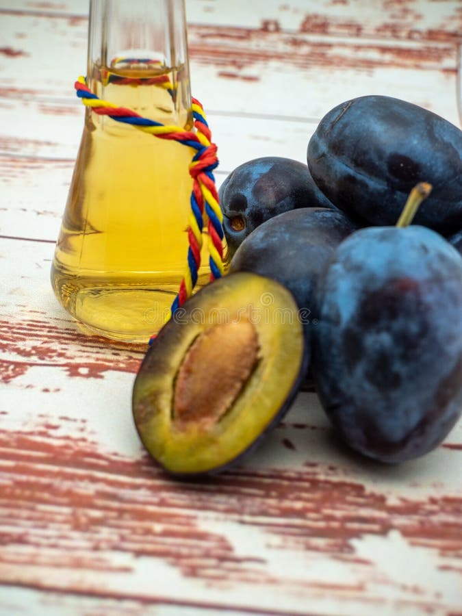 Vertical Shot of a Romanian Plum Alcoholic Beverage Called Tzuica with ...