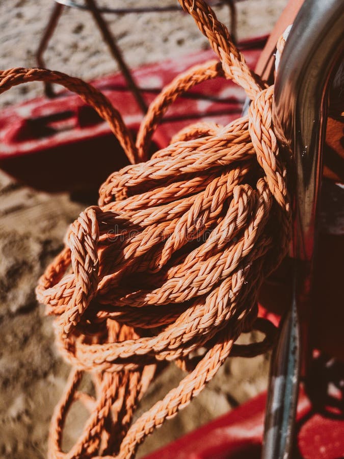 Vertical Shot of a Rope Tied To E Handrail Stock Image - Image of rope ...