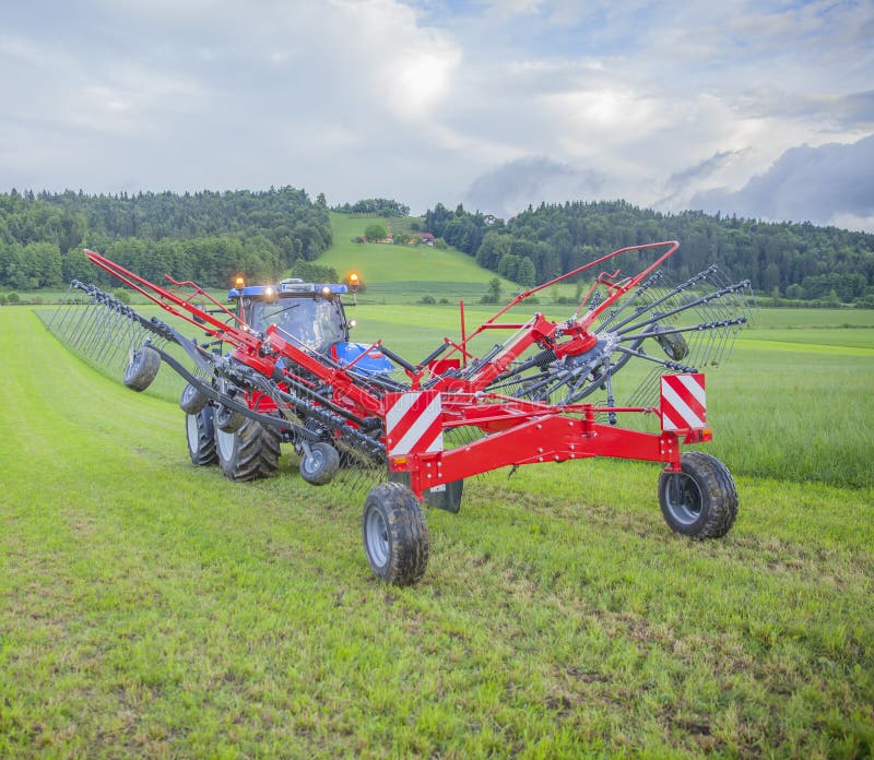 Vertical Shot of Rotary Rakes in an Agricultural Field Stock Photo ...