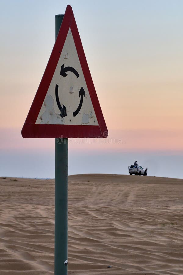 Vertical Shot of a Roundabout Traffic Sign in a Deserted Land Stock ...
