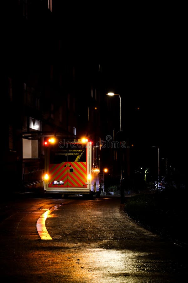 Vertical Shot of the Running Bus on the Road at Night Stock Image ...