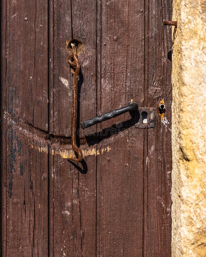 Vertical Shot of Rusty Hook Lock on an Old Wooden Door Stock Image ...