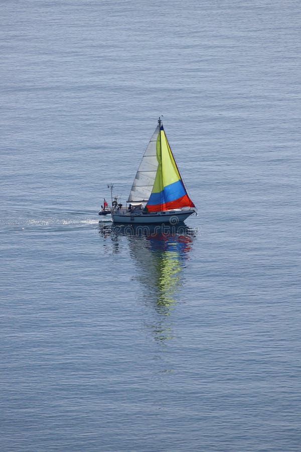 Vertical Shot of Sailing Boat in an Open Sea Stock Image - Image of ...