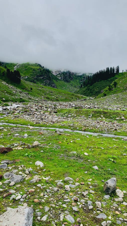 Vertical Shot of the Scenic Hampta Pass with a Small Stream Flowing ...