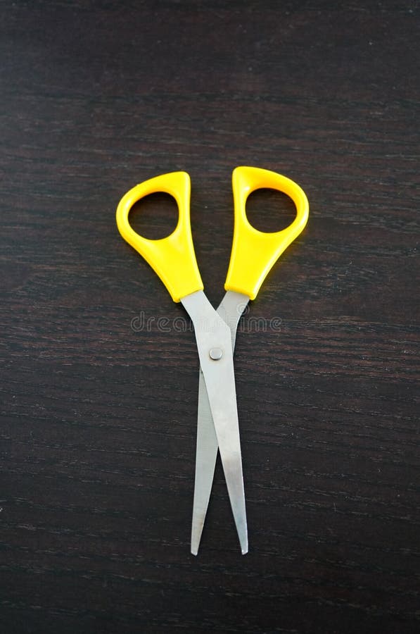 Vertical Shot of Scissors with Yellow Handles Stock Image - Image of ...