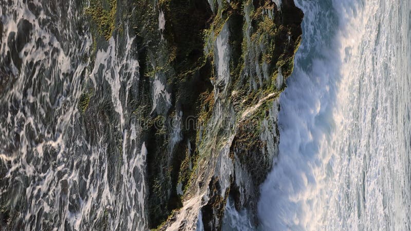 Vertical Shot of the Sea , with Ruffled Waves Creating a Rhythmic ...