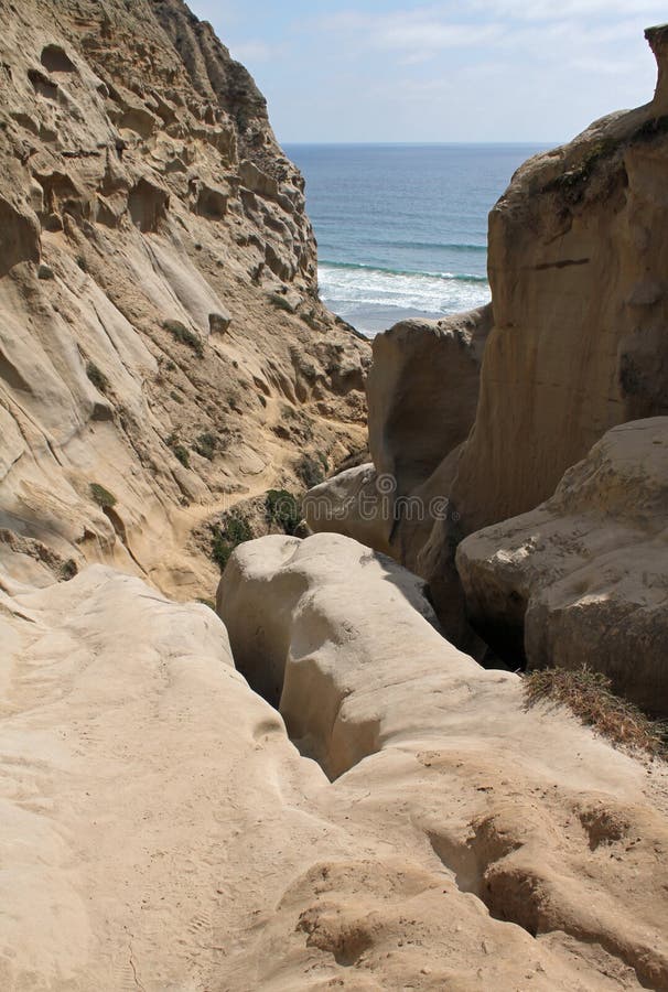 Vertical Shot of Several Cliffs Next To Each Other on the Beach Stock ...
