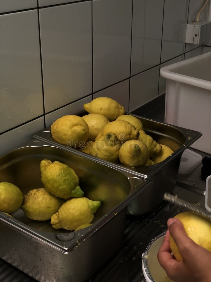 Vertical Shot of Several Lemons Inside Metal Containers Stock Image ...