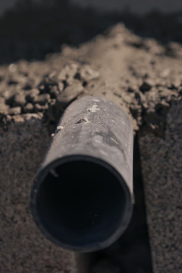 Vertical Shot of a Sewer Pipe Being Built Under Ground Stock Image ...