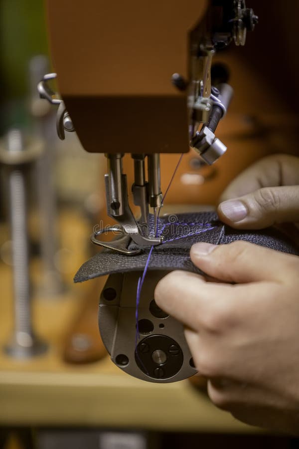 Vertical Shot of Sewing a Box Stitch on Black Leather Stock Image ...