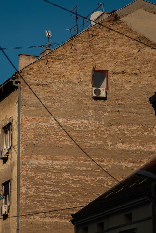 Vertical Shot of the Side of a Brown Building at Daytime Stock Image ...