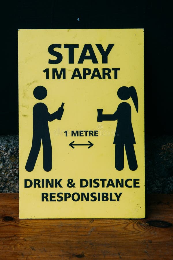 Vertical Shot of a Sign with Stay Away 1 M Away Text Stock Image ...