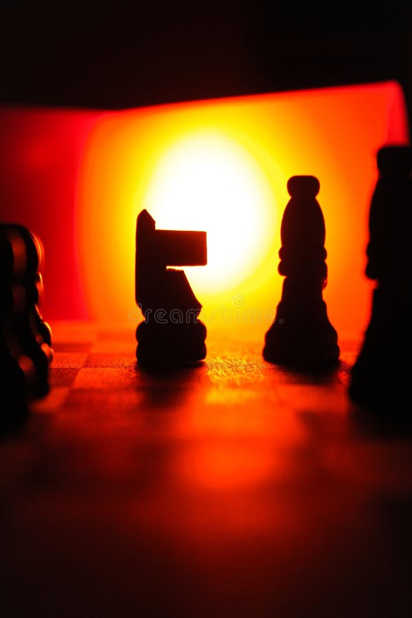 Vertical Shot of the Silhouettes of the Chess Pieces with the Bright ...