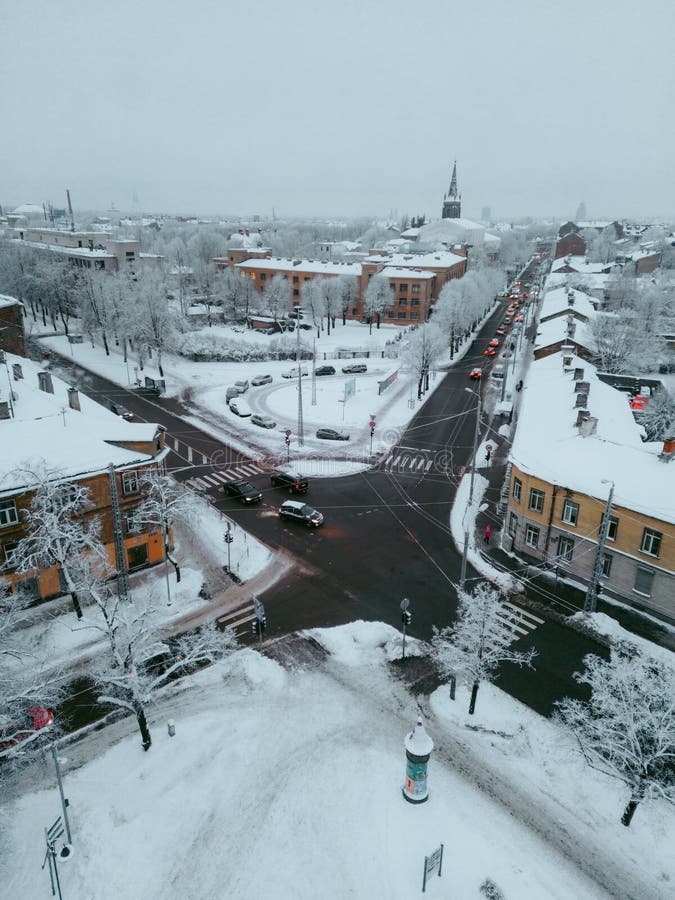 Vertical Shot of a Snow-covered City Stock Photo - Image of vertical ...