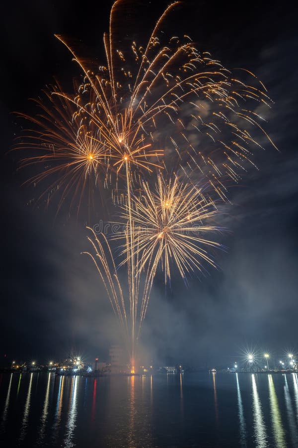 Vertical Shot of a Spectacular Night Sky with an Array of Fireworks ...