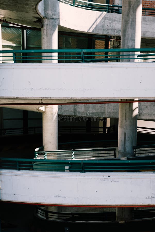 A Spiral Ramp in a Concrete Parking Garage. Stock Image - Image of ...