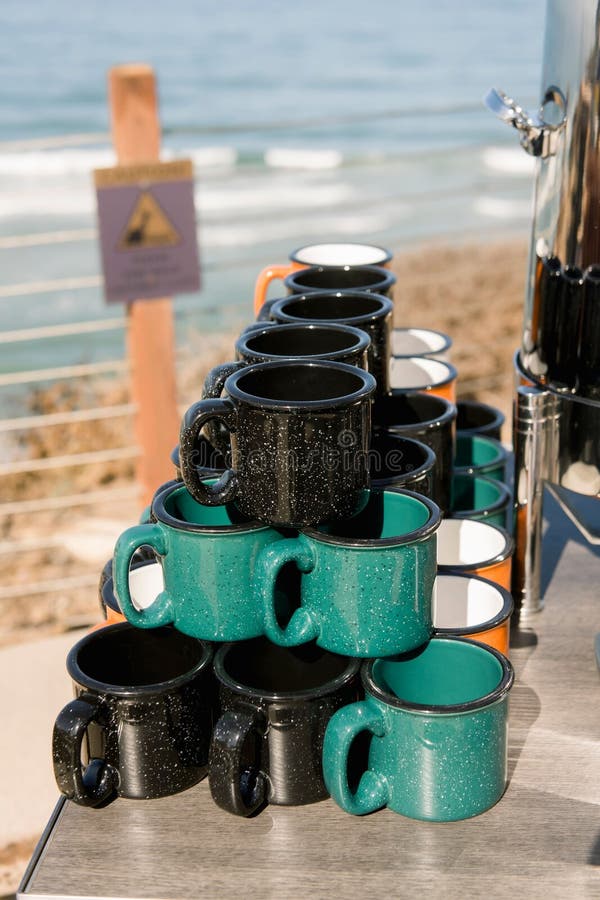 Vertical Shot of a Stack of Handmade Clay Cups at a Store Stock Photo ...