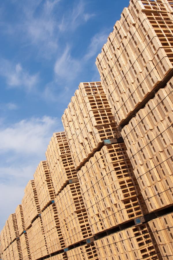 Vertical Shot of a Stack of Wooden Pallets in a Warehouse Cargo Storage ...