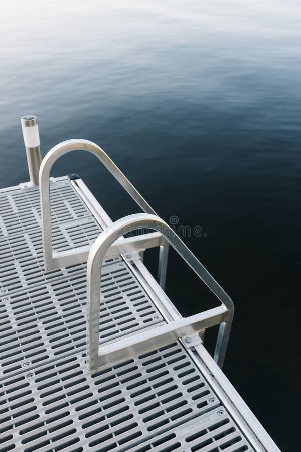 Vertical Shot of Stairs of a Dock Leading To the Water Stock Photo ...