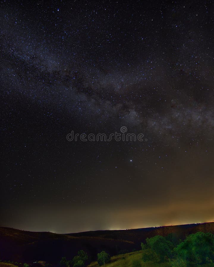 Vertical Shot of a Starry Sky Over the Mountains Stock Image - Image of ...