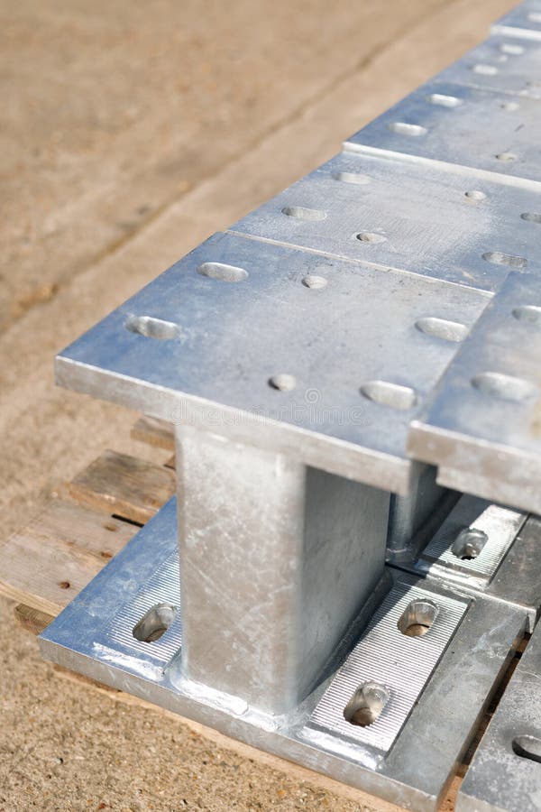 Steel Connection of Two Red Beams on Bolts. Angular Connection of ...