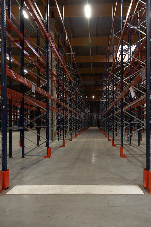 Vertical Shot of Storage Racks in a Warehouse Stock Image - Image of ...