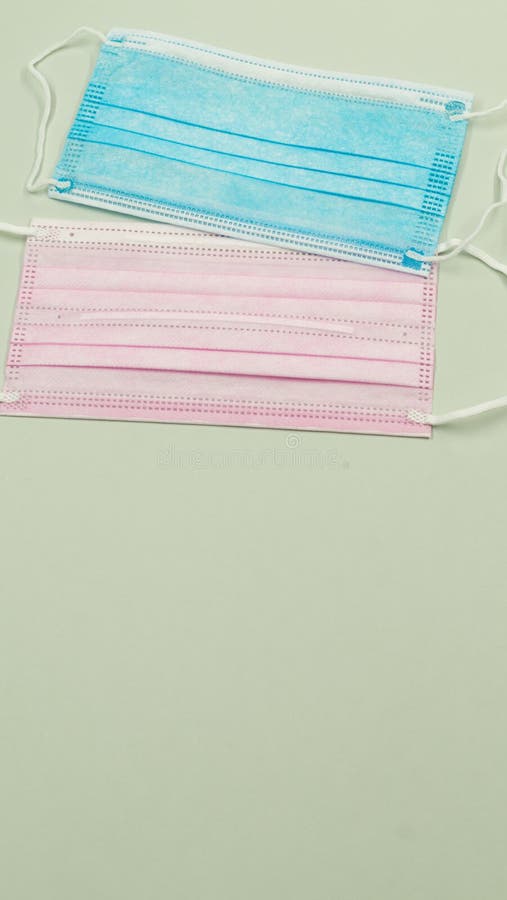 Vertical Shot of Surgical Masks on a White Surface Stock Photo - Image ...