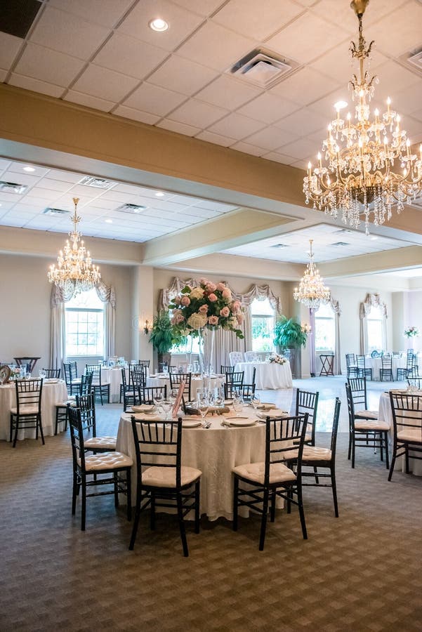 Vertical Shot of a Table Setting at the Reception at the Wedding Hall ...