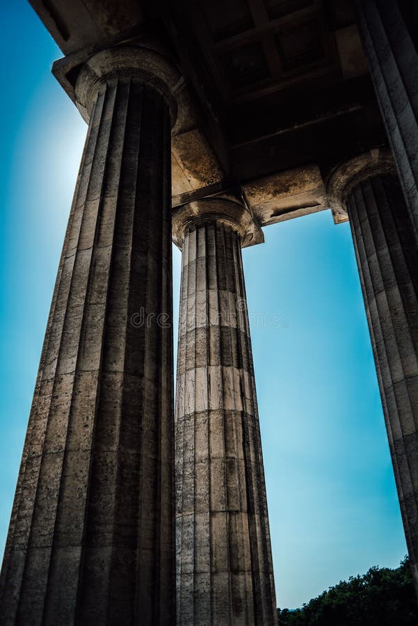 Vertical Shot of the Three Pillars Under Clear Blue Sky Stock Photo ...