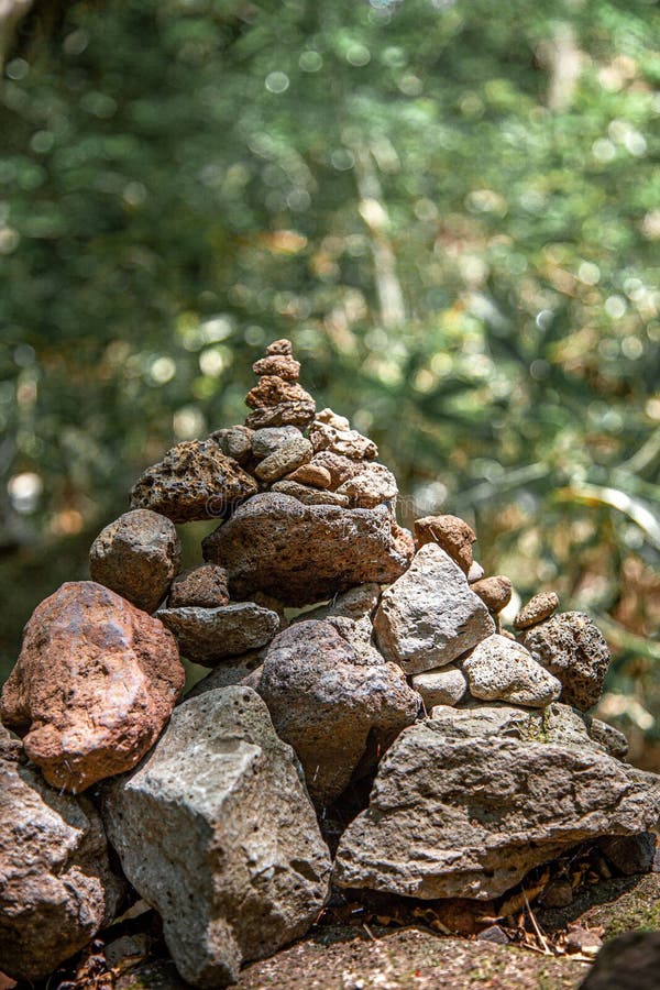 Rock Tower on a Natural Rock Formation Against an Ocean Background and ...