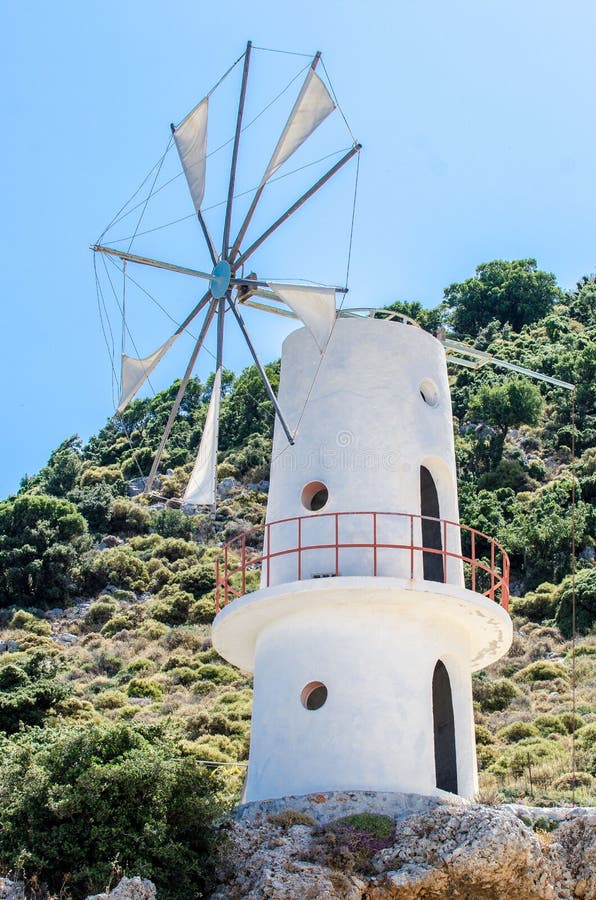 Vertical Shot of a Traditional Greek White Windmill. Stock Image ...