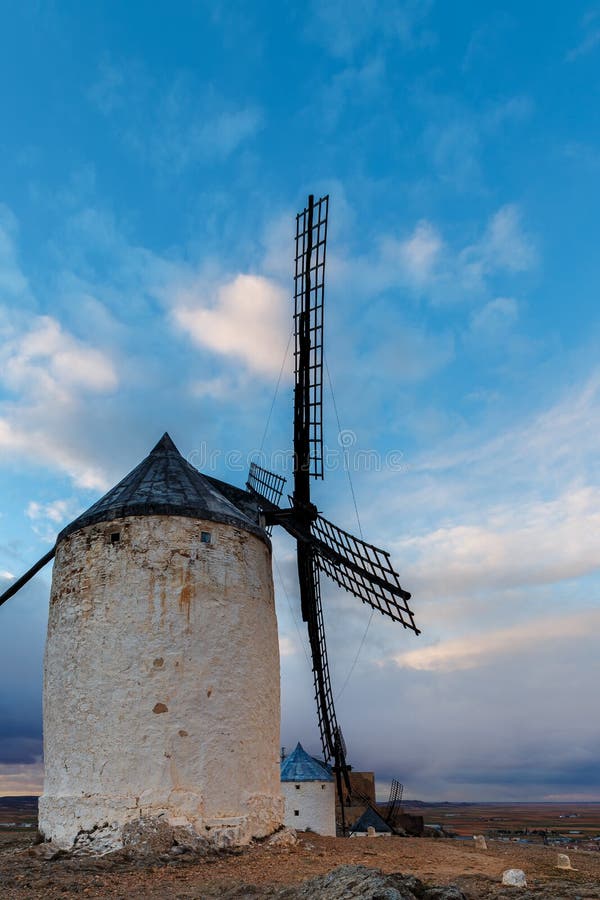Vertical Shot of Traditional White Windmills Stock Photo - Image of ...