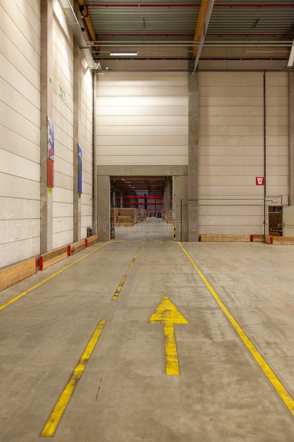 Vertical Shot of a Traffic Lane in a Warehouse Stock Image - Image of ...