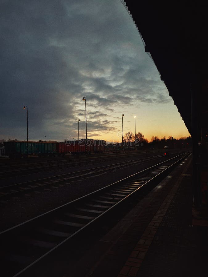 Vertical Shot of Train Rails at Sunset Stock Image - Image of traffic ...