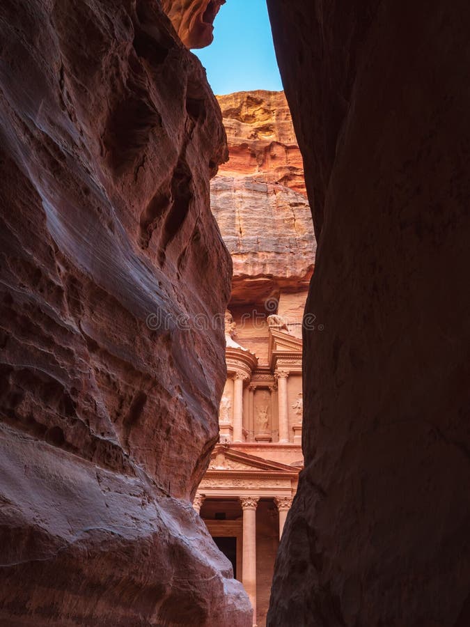Vertical Shot of the Treasury Temple Seen through a Narrow Path between ...