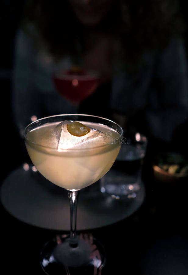 Vertical Shot of a Tropical Cocktail in a Bar Stock Photo - Image of ...