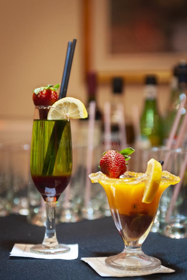 Vertical Shot of Two Glasses of Classical Cocktail Drinks on a Table ...