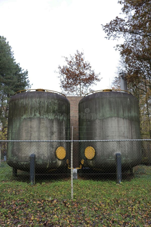 Vertical Shot of Two Massive Water Tanks in a Forest in Waterloopbos ...