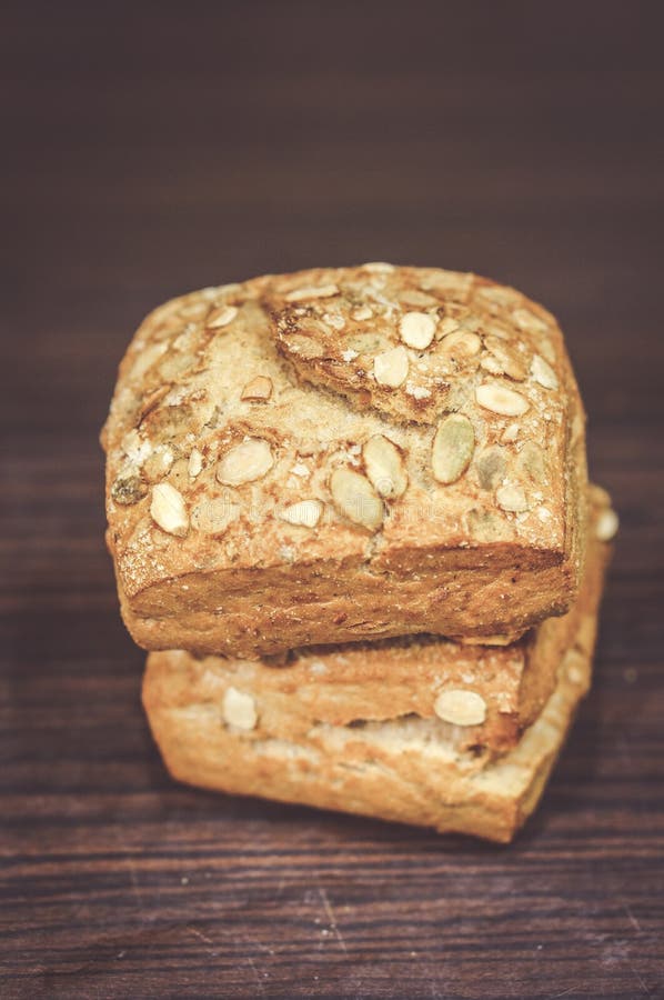 Vertical Shot of Two Pieces of Bread on the Table Stock Image - Image ...