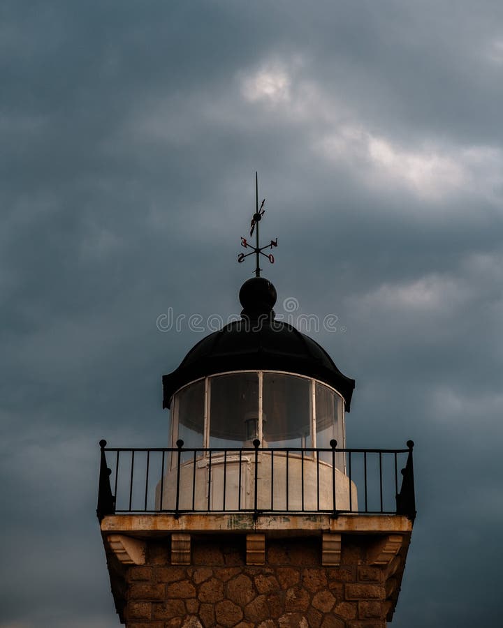 Vertical Shot of an Upper Part of a Lighthouse Under the Gloomy Sky ...