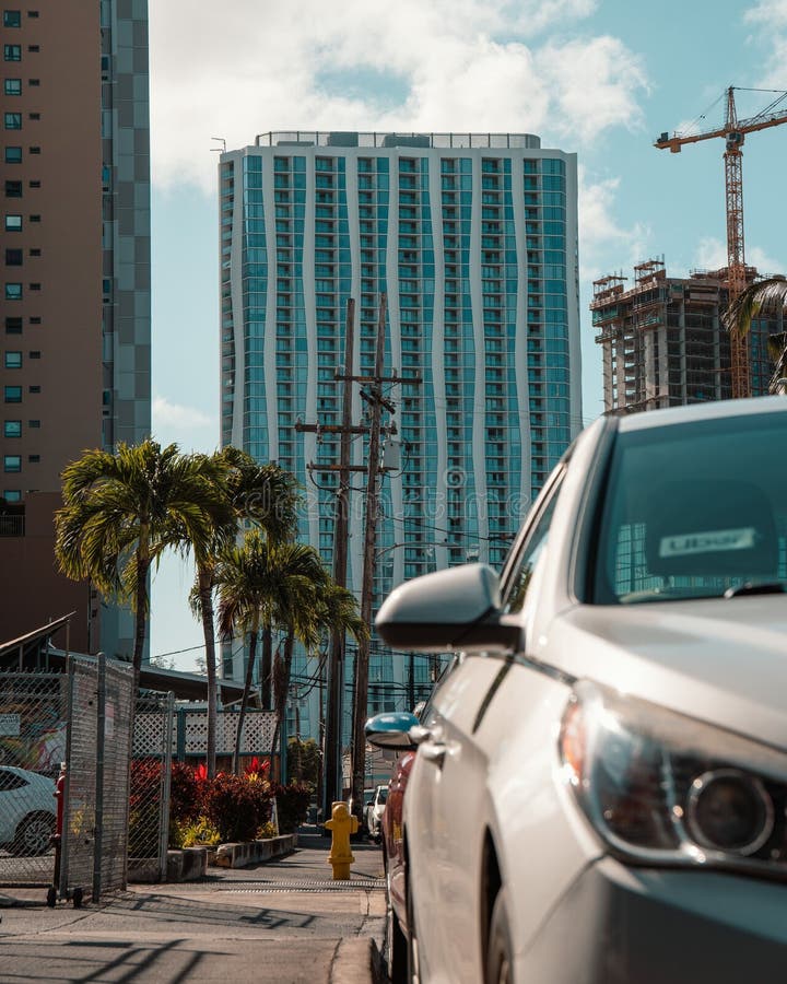Vertical Shot of an Urban Setting Featuring a Large Modern Building ...