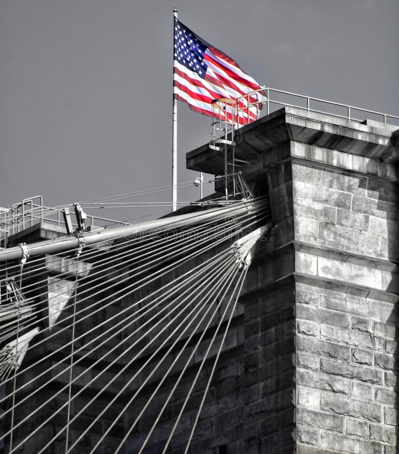 Vertical Shot of the US Flag on Brooklyn Bridge, New York. Stock Image ...