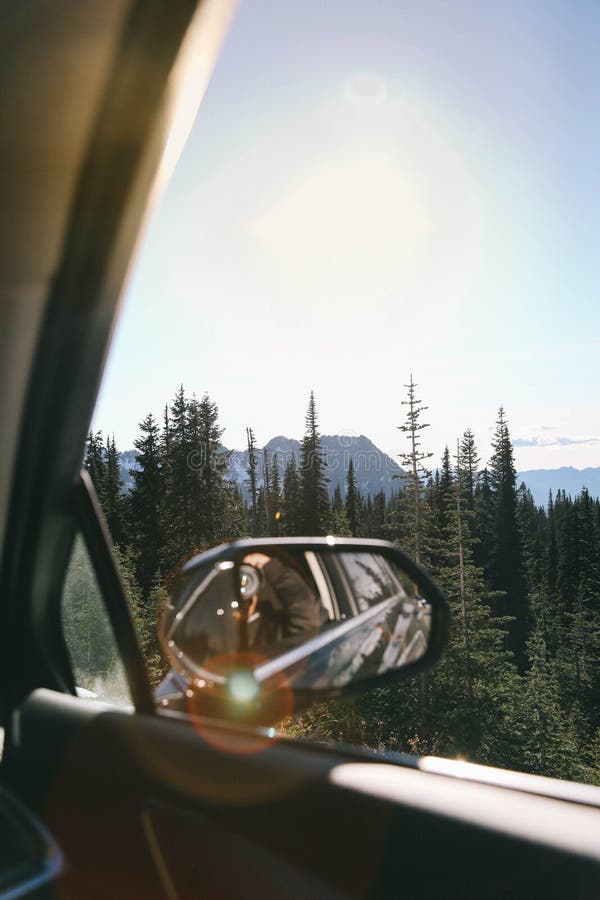 Vertical Shot of the View of Forested Mountains Froma Car Window Stock ...