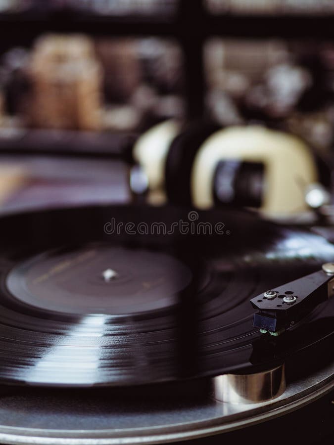 Vertical Shot of a Vinyl Record on a Turntable Deck Stock Photo - Image ...