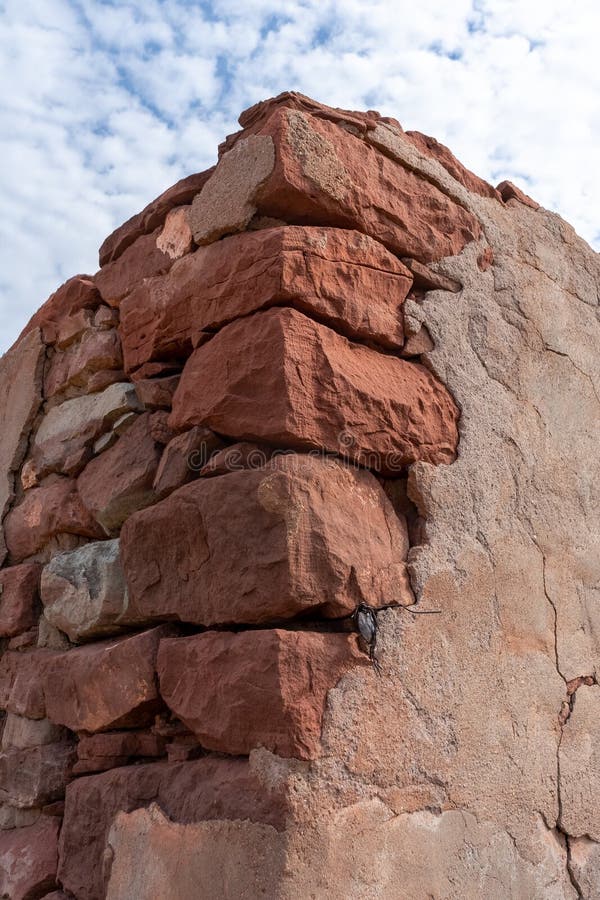 Vertical Shot of the Walls of a Ruined Building Under a Clo Stock Image ...