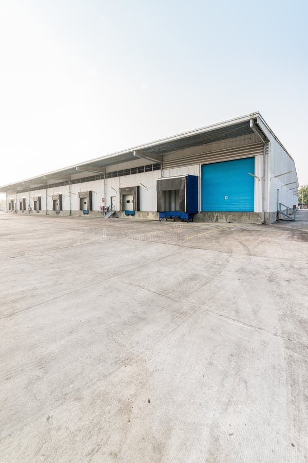 Vertical Shot of a Warehouse with a Clear Sky in the Background Stock ...