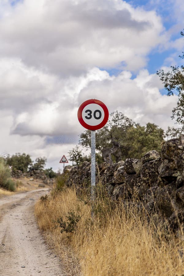 Vertical Shot of a Warning Sign Near the Rails Stock Image - Image of ...